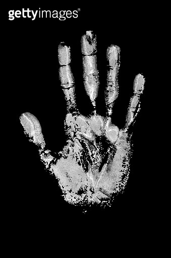 White print of human hand black background isolated closeup, handprint ...