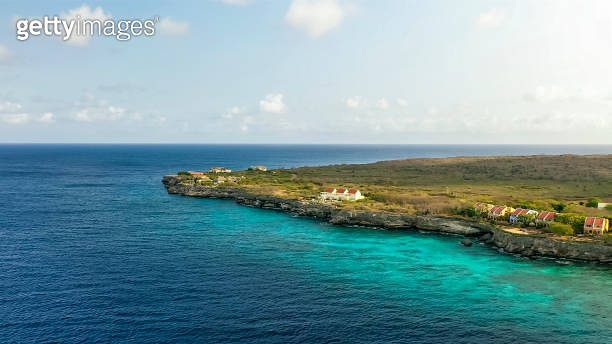 Aerial view of coast of Curacao in the Caribbean Sea with turquoise ...