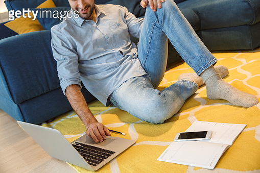 Bachelor man daily routine in the living room single lifestyle concept ...