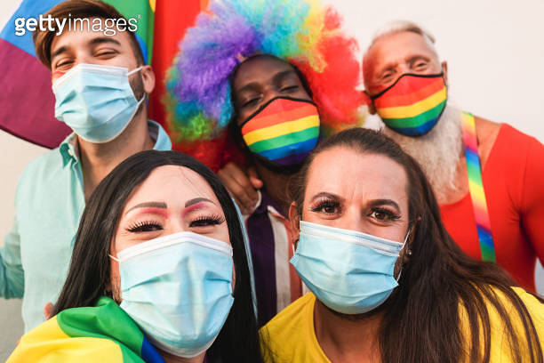 Group of friends enjoying the LGBT parade taking a selfie during ...