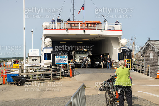 Passengers and cars embarking from the iconic Block Island Ferry at the ...
