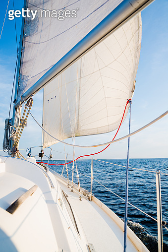 Sloop rigged yacht sailing in an open Baltic sea on a clear day. Close ...