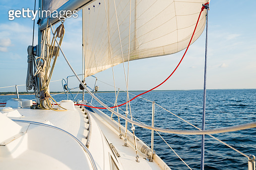 Sloop rigged yacht sailing in an open Baltic sea on a clear day. Close ...