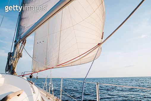 Sloop rigged yacht sailing in an open Baltic sea on a clear day. Close ...