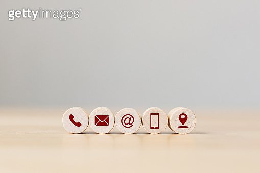 Wooden sphere with symbol telephone, email, address mobile and location ...