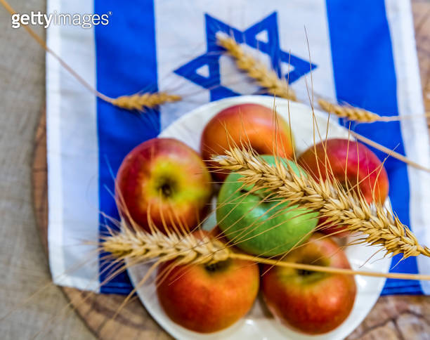 Apples and ears of wheat for Shavuot - traditional Jewish holiday of ...