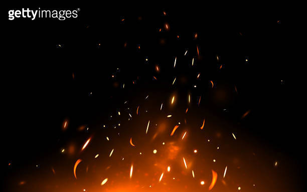 Fire sparks and particles on dark backdrop. Realistic bonfire with heat ...