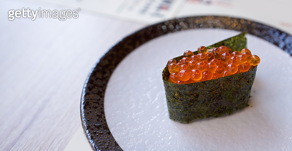 Ikura Gunkan Maki. Salmon Roe Gunkan Sushi served on white plate ...