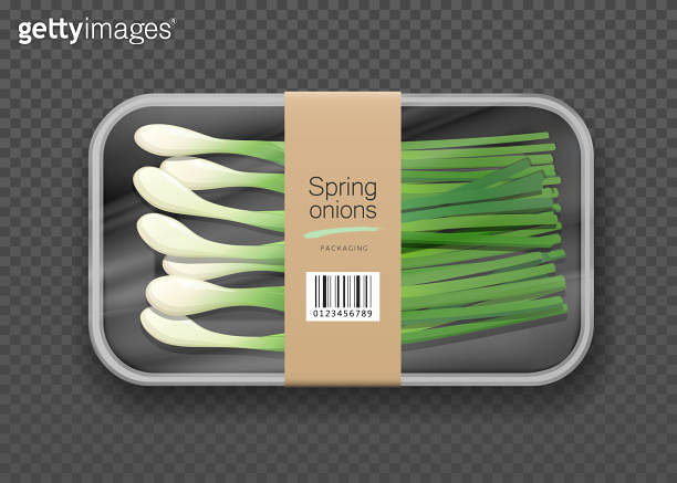 Spring onions one packaging, in black foam tray wrapped in plastic with ...