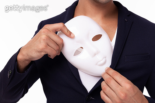 Two faced of Businessman hide white mask and put artificial mask to ...