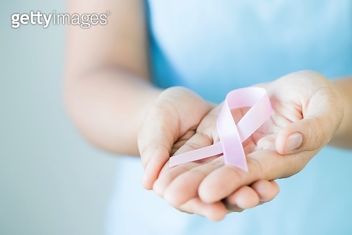 Hand holding pink ribbon, hiv awareness concept, world AIDS day 이미지 ...