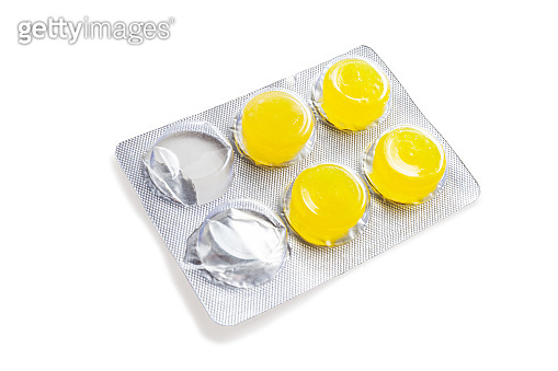 Lemon tablets lozenges for coughing and perspiration in the throat in a ...