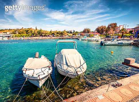 Wonderful spring scene of the Porto Rafti port. Sunny morning seascape ...