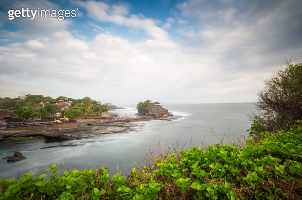 Sunset near famous tourist landmark of Bali island - Tanah Lot & Batu ...
