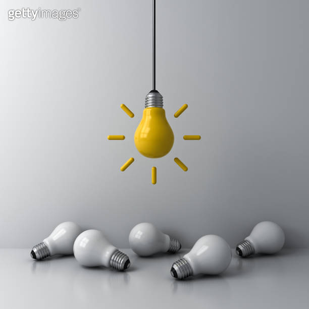 Idea hanging bulb standing out from the crowd the dim unlit white bulbs ...