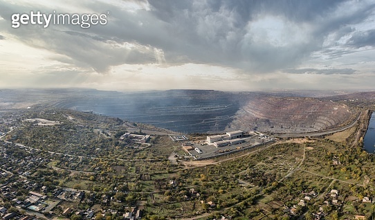 Aerial view of management building near a huge quarry at southern ...