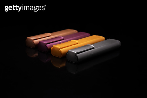 Side view of a colored markers set (silver, gold, ruby and pearl rose ...