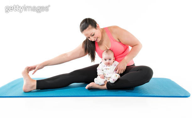 Sport motherhood and active lifestyle of young mother workout together ...