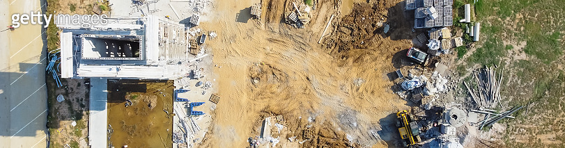 Panorama aerial view construction site with elevator shaft towers and ...