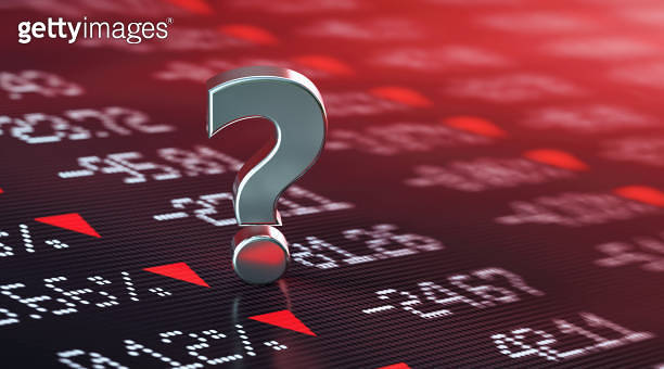 Question Mark Sitting Over A Trading Board Which is Showing A Stock ...