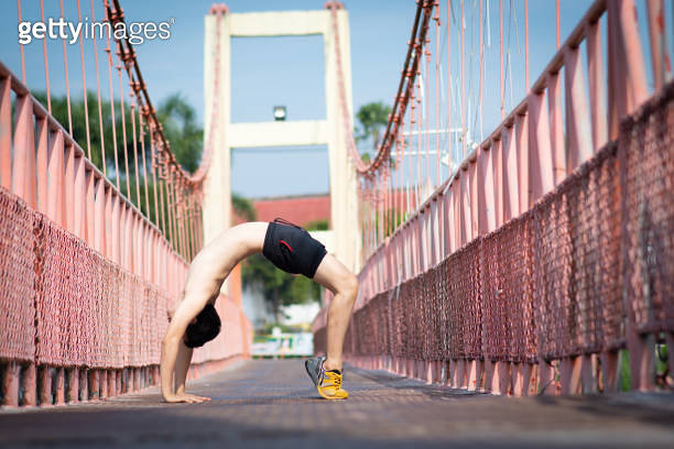 Bridge pose sporty men doing warming up exercise for spine, backbend ...