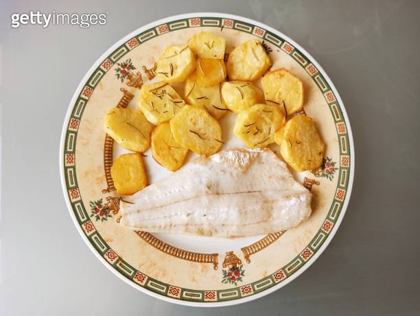 Whiting haddock fish in oven with potato in Istanbul turkey 이미지 ...