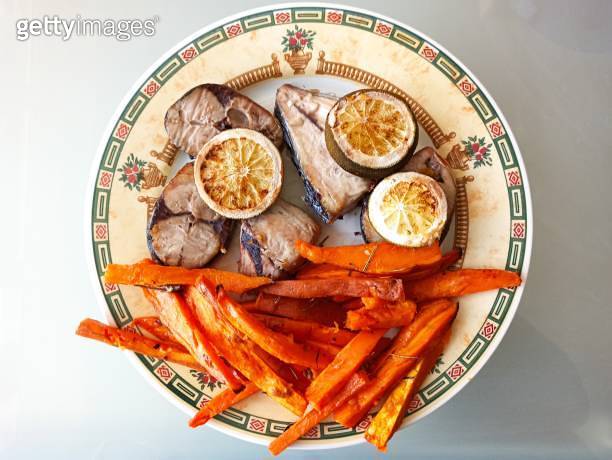 Traditional turkish bonito fish lime and sweet potato dish in Istanbul ...
