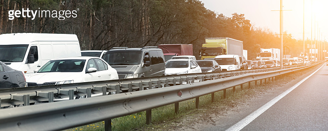 Highway interstate road with car traffic jam and tree forest on ...