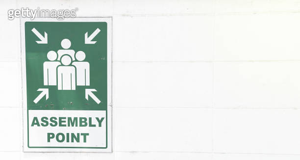 Emergency evacuation assembly point sign, gathering point signboard in ...