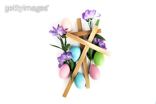 Colorful Easter eggs and wooden crosses show the religious and secular ...
