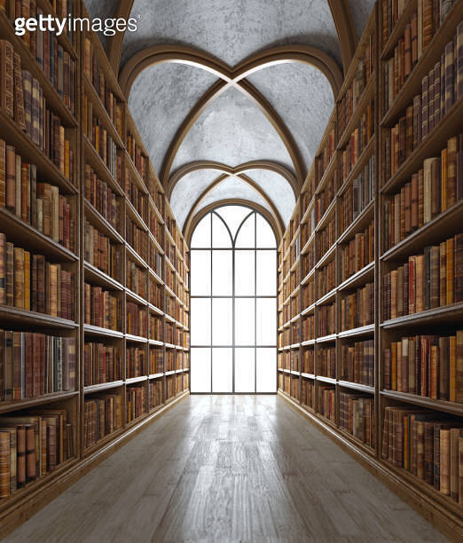 Light coming through arched window in library or reading room with many ...