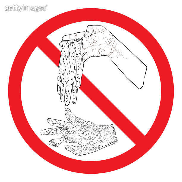 Hand throwing litter or trash, disposable medical used rubber gloves on ...