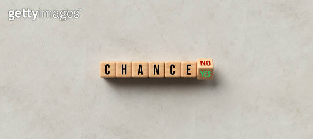 cubes with letters showing the word CHANCE and the answer YES or NO ...