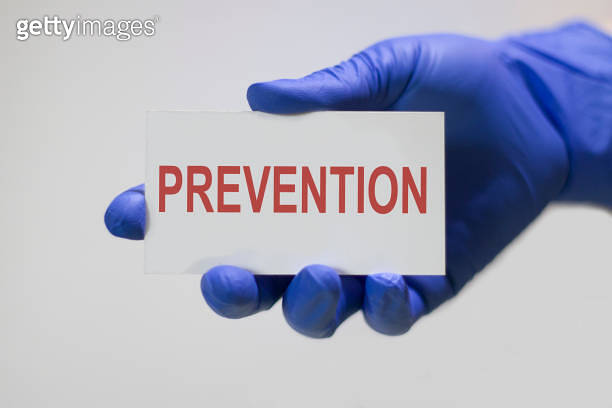 Prevention text on card and hand holding it. Healthcare or prevention ...