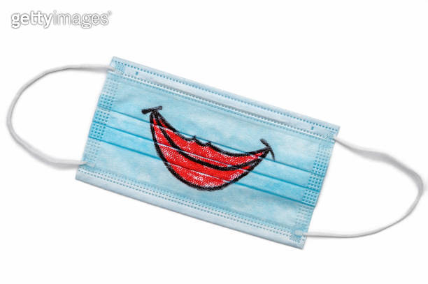 Mask isolated on white background with painted friendly mouth as a ...