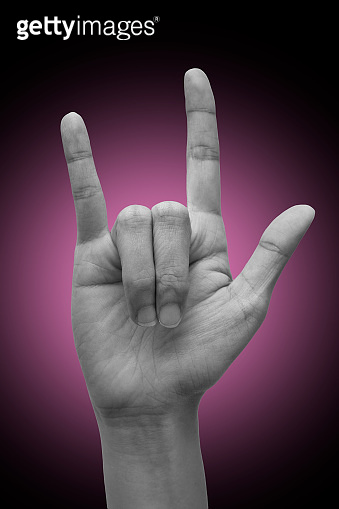 Female's hand doing sign language "I love you". isolated on gradient ...