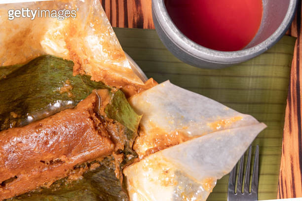 "Los Pasteles" is a typical Puerto Rican food made with viands and meat ...