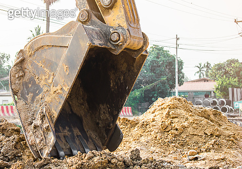 close up bucket digger backhoe,backhoe loader working at construction ...
