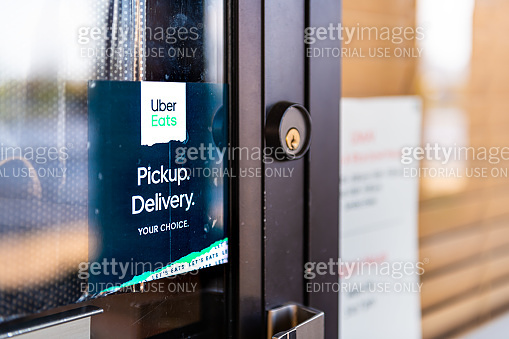 Sign and door entrance for restaurant and take out during coronavirus ...
