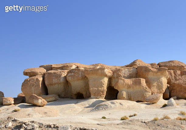 Al-Qarah mountain - erosion in progress, pre-hoodoos, Al-Qarah village ...