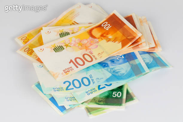 Lots of 50, 100 and 200 Israeli Shekels (NIS) bank note isolated on ...