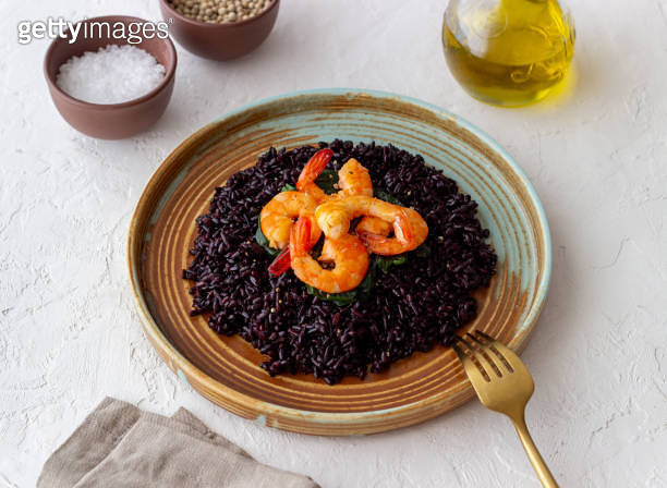 Black rice risotto with shrimp. Sea food. Diet. Healthy eating. 이미지 ...