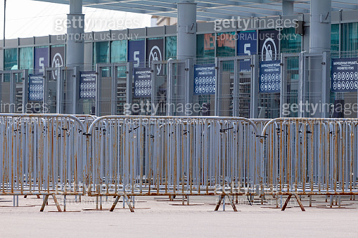 A system of metal fences in front of the stadium entrance 이미지 ...