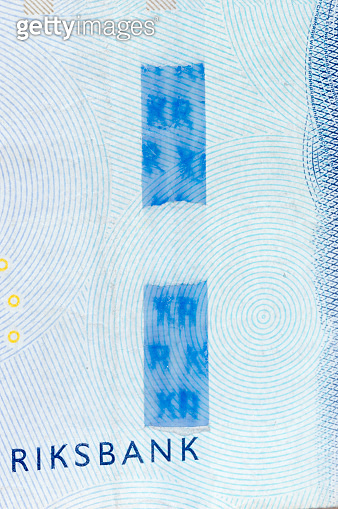 Plastic security strip in 100 SEK banknote. Security strip on Swedish ...