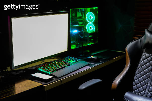 green high end gaming and workstation computer with gaming chair and ...
