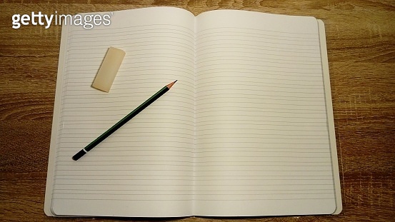 U-turn notebook with white blank sheets. On the left page are a graphic ...