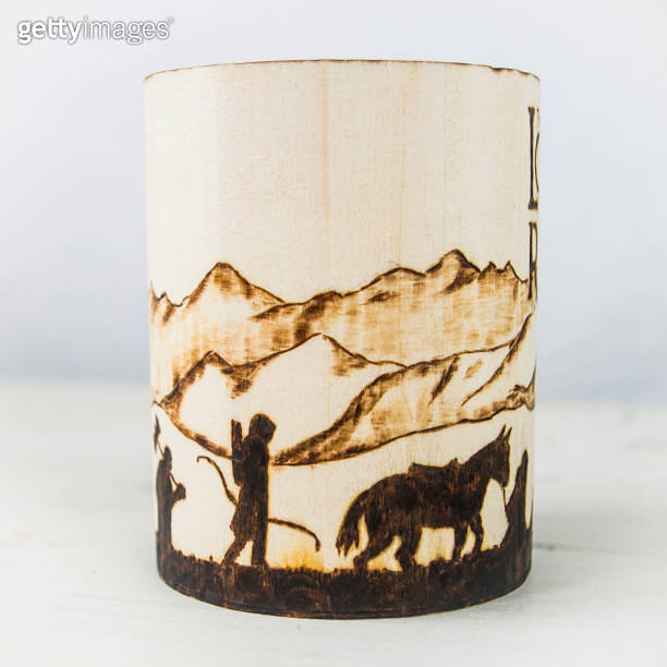 the ancient art of pyrography, wood and fire, men walk to mountains for ...