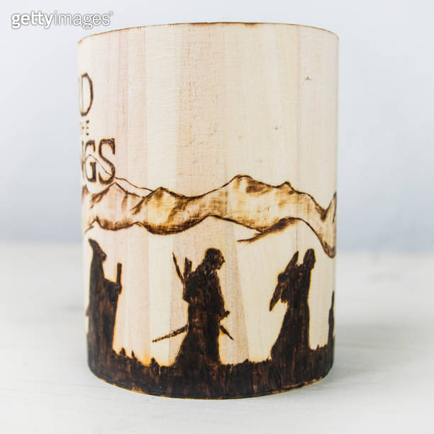 the ancient art of pyrography, wood and fire, men walk to mountains for ...