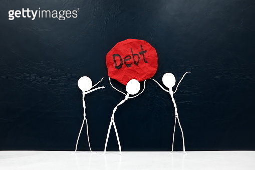 Three stick man figure together carrying a red rock with written word ...