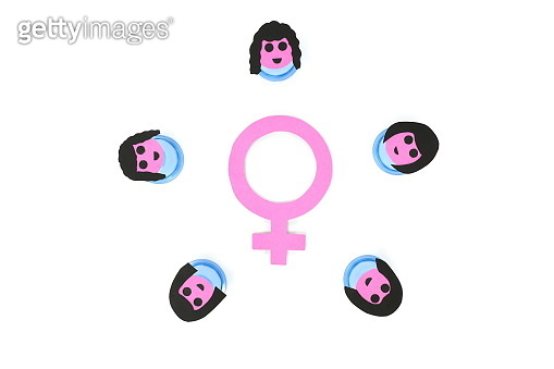 Pink female symbol with a group of women character flat lay in white ...